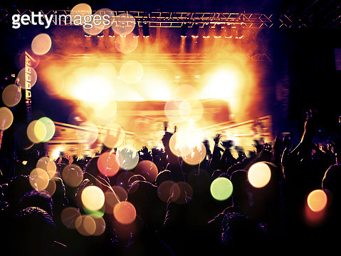 Concert venue crowded with distress effects and lens flare (966187058 ...