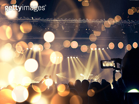 Concert venue crowded with distress effects and lens flare (966187378 ...