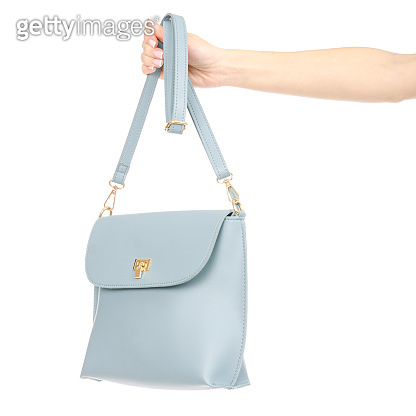 Woman's female blue leather bag in hand pulls out of the bag 이미지 ...