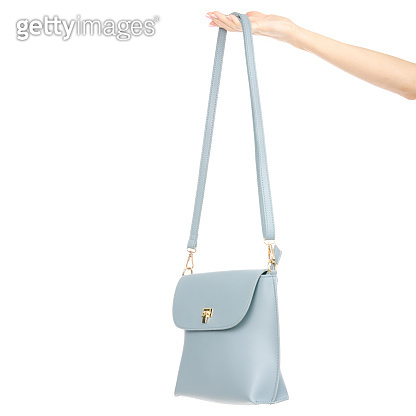 Woman's female blue leather bag in hand pulls out of the bag 이미지 ...