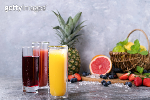 Orange, blackcurrant and strawberry juice (1076738868) - 게티이미지뱅크