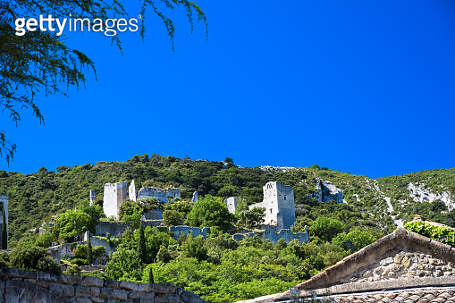 Panorama view of the ruins of the medieval village of Oppede-le-Vieux ...