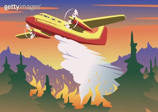 Firefighting plane dropping water above burning forest. Aerial ...
