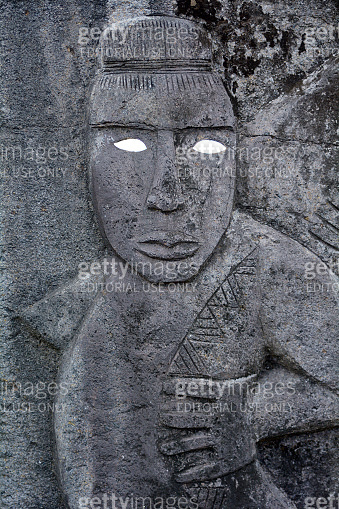 Polynesian male figurine rock carving in basalt sculpture (939384552 ...