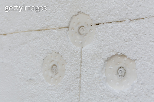 Insulation of the house with styrofoam. Energy saving concept. Closeup ...