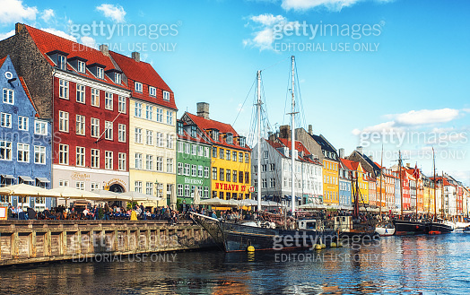 Nyhavn district is one of the most famous and beautiful landmark in ...