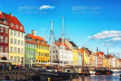 Nyhavn district is one of the most famous and beautiful landmark in ...