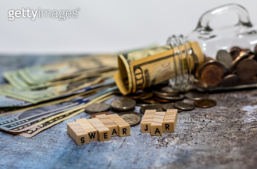 Swear Jar challenge concept with glass jar filled with coins, simple ...