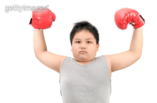 overweight kid boxing show muscle isolated 이미지 (1018187910) - 게티이미지뱅크