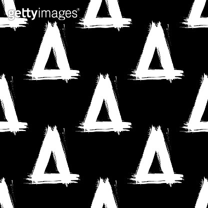 Seamless pattern with white hand-drawn triangles isolated on black ...