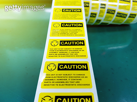 Yellow caution label,Standard caution label with text 'Caution' for ...