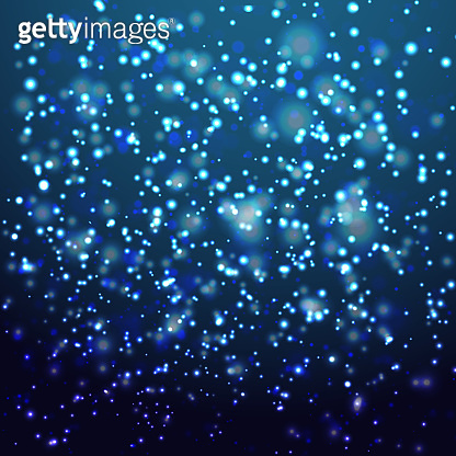 Abstract colorful bokeh and glowing spakling shining particles in ...