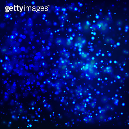 Abstract colorful bokeh and glowing spakling shining particles in ...