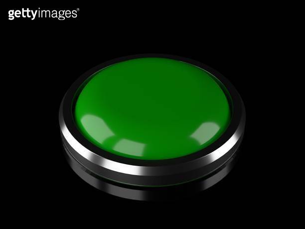 Green Shiny Button With Metallic Elements Isolated on Black Background ...
