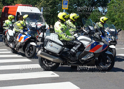 Dutch Police Officers With Motorcycle View In The Hague South Holland ...