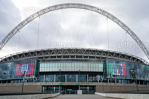 The screen in front of New Wembley Stadium shows England and Italia ...