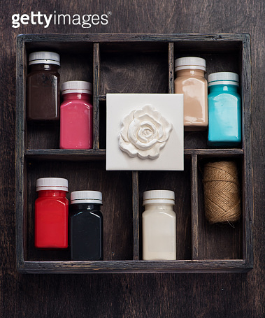 Paints for drawing in a wooden box, top view. Set for the artist and ...