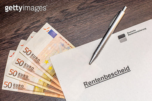 Sheet with the German word for pension notice and 50 Euro notes with ...
