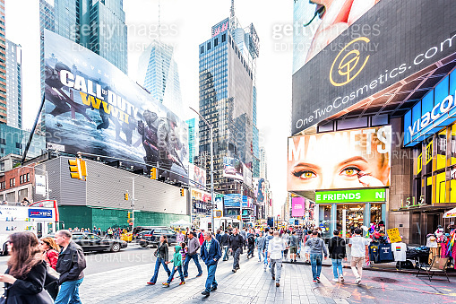 Manhattan NYC buildings of midtown Times Square, Broadway avenue road, signs ads, many large ...