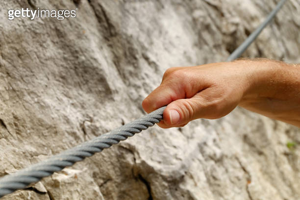 Hand at a steel rope, Climbing in the mountain, Alps - Europe 이미지 ...