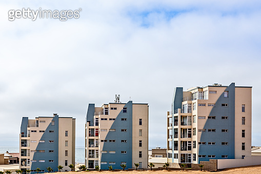 Modern touristic buildings of Dolfynstrand resort at the seaside, close ...