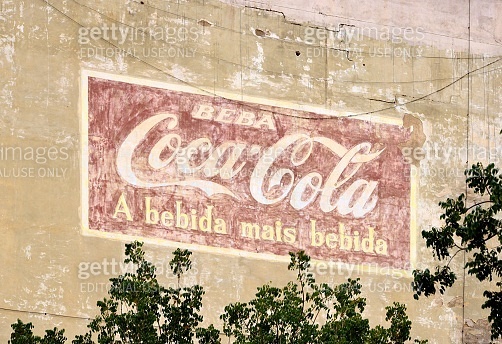 Luanda - a 1970s ad for Coca-Cola survives on a building side, Angola ...