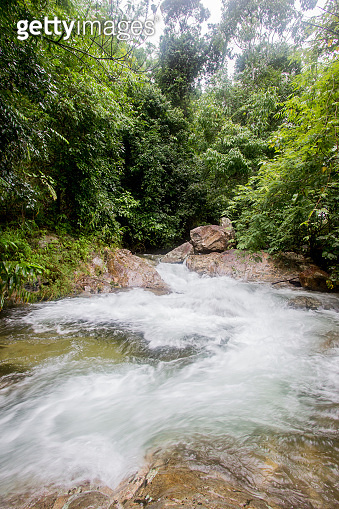 Small waterfall with cryatal clear water stream near the campground on ...