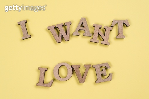 Word I want love in abstract wooden letters, yellow background. 이미지 ...