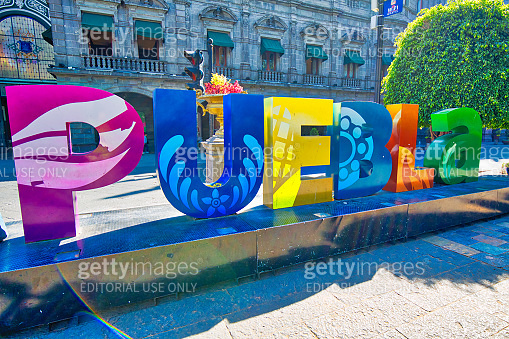Puebla streets in historic city center, big letters displaying a city ...