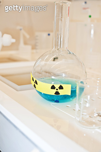 Radiation Research And Development: Scientist Examines Blue Radioactive ...