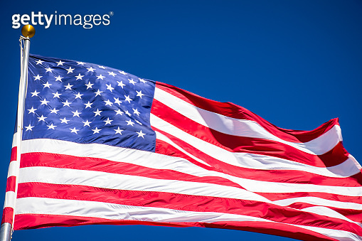 Perfect sunny day for the American flag a symbol of Freedom around the ...