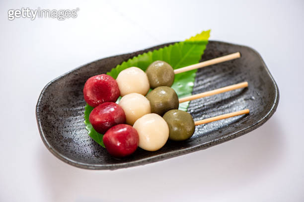 Japanese Dango dessert with 3 different color in pink(red), white, and ...