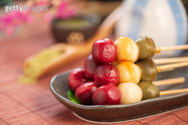 Japanese Dango dessert with 3 different color in pink(red), white, and ...