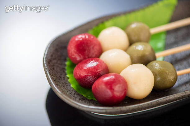Japanese Dango dessert with 3 different color in pink(red), white, and ...