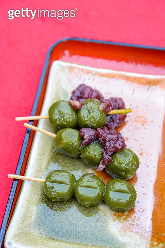 (Yomogi dango) Dango with organic matcha green tea and red bean on ...