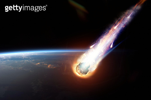 A comet, an asteroid, a meteorite glows, enters the earth's atmosphere ...