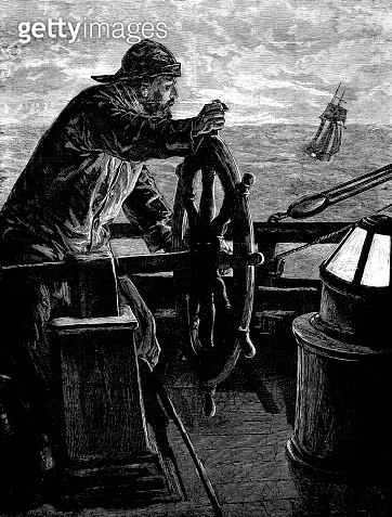 Victorian engraving of a sailor stood at the ships wheel with a light ...