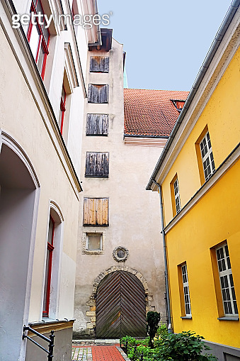 Medieval street in old Riga, Latvia, Europe. In old Riga tourists can ...
