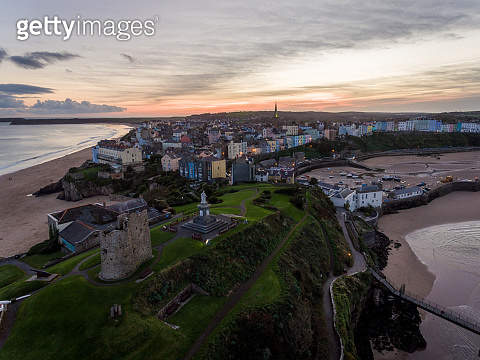 Aerial view of Tenby Beach and harbour at sunset, Pembrokeshire, Wales ...