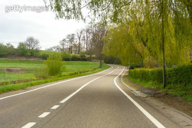 Winding road dutch Belgium german border area 이미지 (1070075978) - 게티이미지뱅크