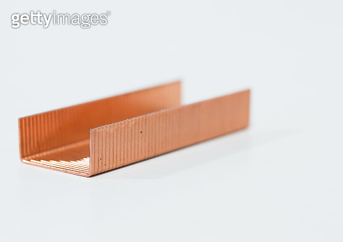 Metal staples of copper for stapler, in insulation with white ...