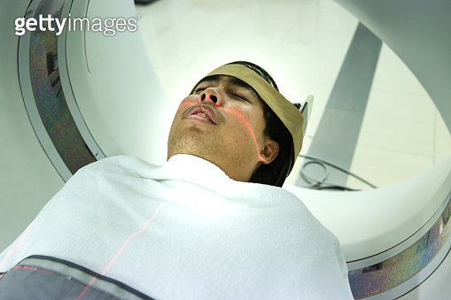 Process of CT scanning of an old patient. Man Receiving a Medical Scan ...