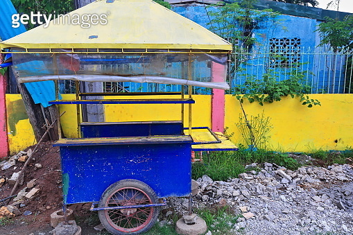 Abandoned foodcart painted yellow and blue. Puerto Princesa-Palawan ...