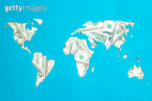 World map. Continents are laid out of dollars. Capitalism, consumer ...