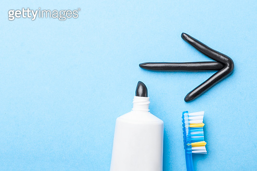 Black toothpaste from charcoal for white teeth. Toothpaste in the form ...