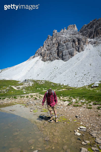 Senior Man Hiking in the National Park Tre Cime di Lavaredo from the Small Lake, Location ...