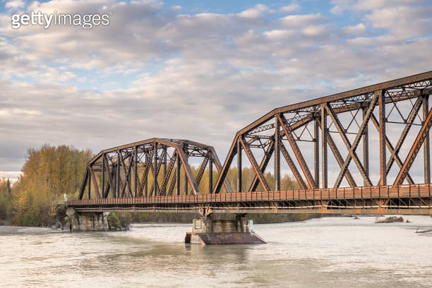Famous Susitna river bridge, railroad over river in Talkeetna. Alaska ...