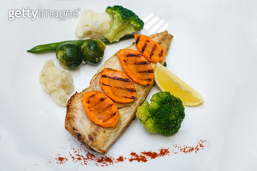 Baked mackerel fish stuffed with carrots. Top flat view. Close-up. 이미지 ...