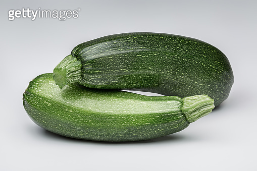 Fresh vegetables. Still lifes. Two green zucchini. (1019918932) - 게티이미지뱅크