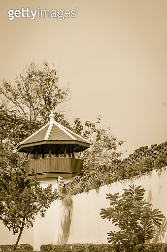 Old prison guard tower that constructed with brick, wood and red roof ...